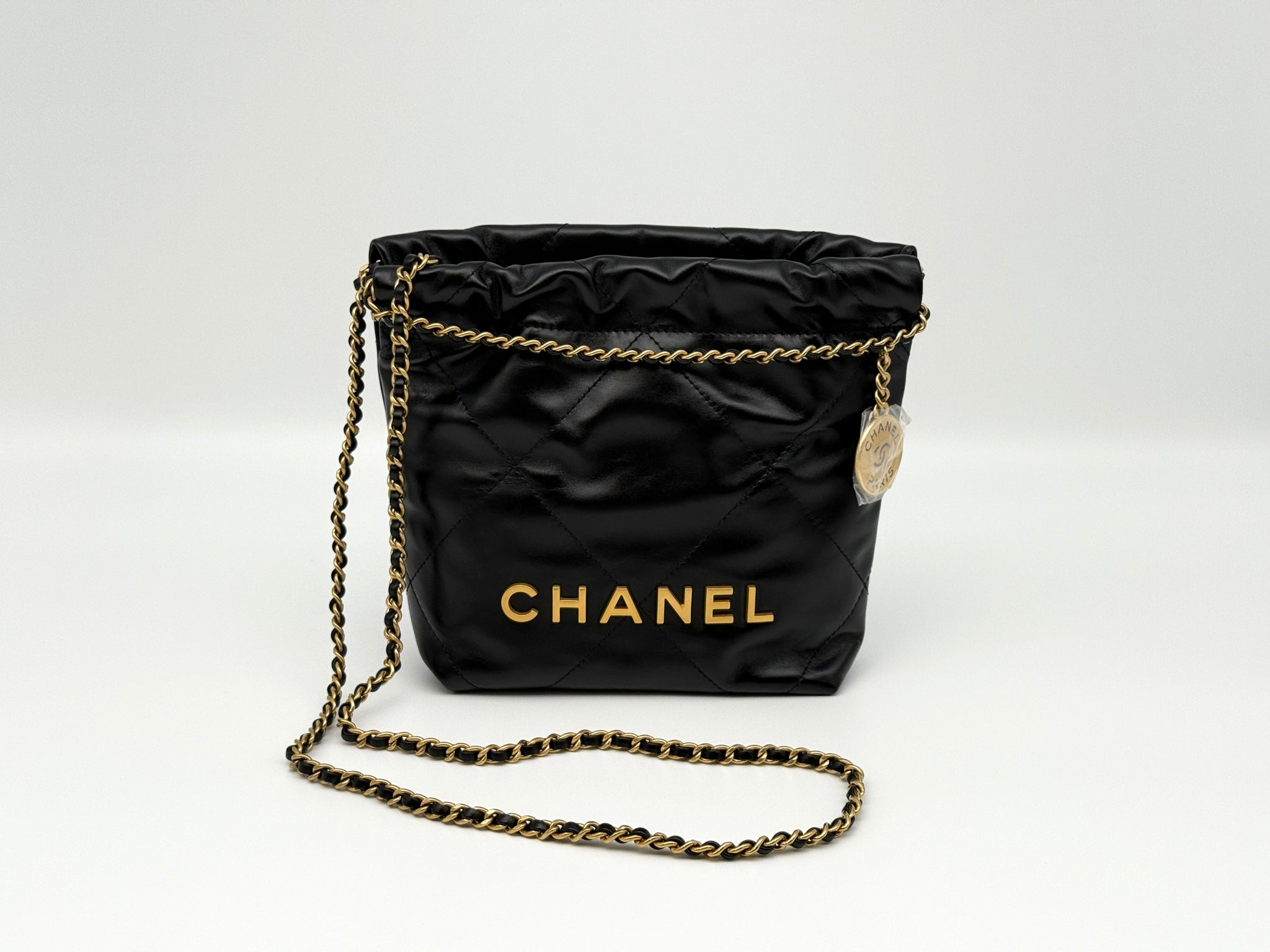Chanel 22 Mini Handbag 23B Black Shiny Calfskin Leather with Aged Gold ...